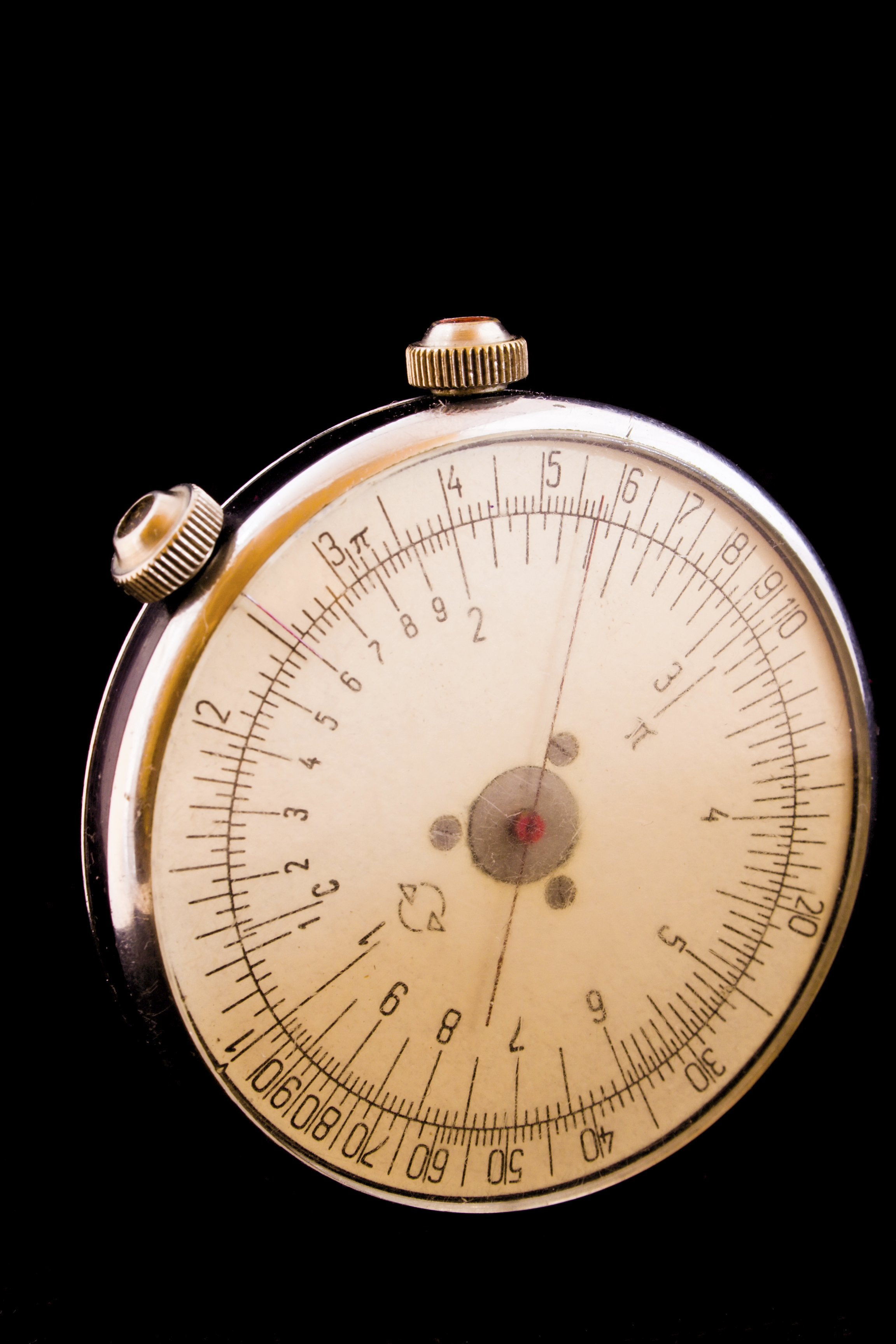 retro round slide-rule with fine scratched glass – Bow Tie Law
